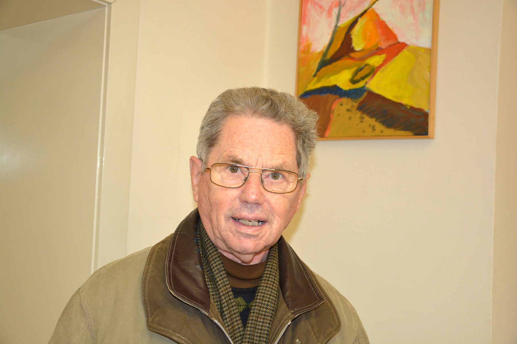 Profesor v belem plašču